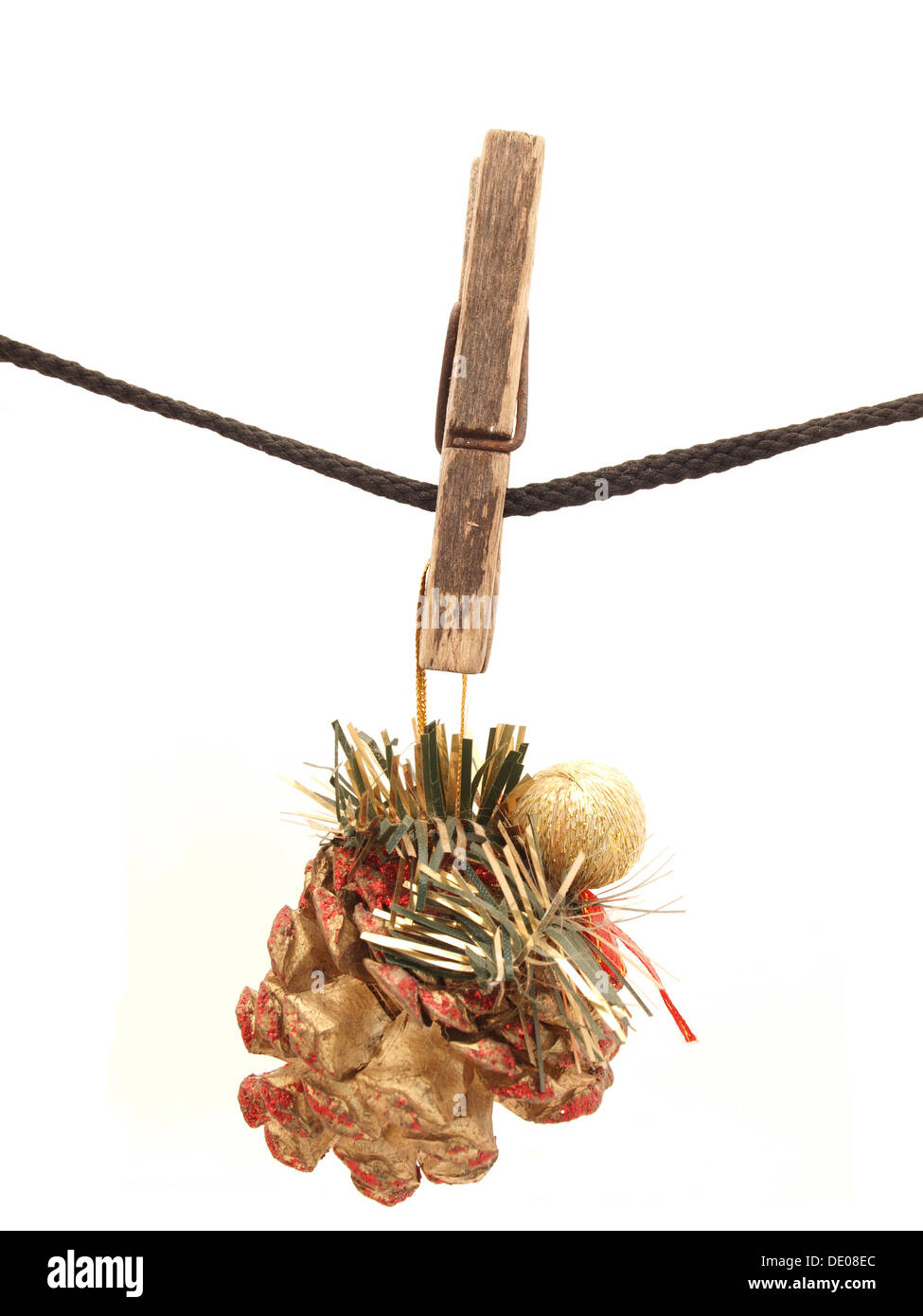 Cone, clothespins and rope on a white background Stock Photo - Alamy