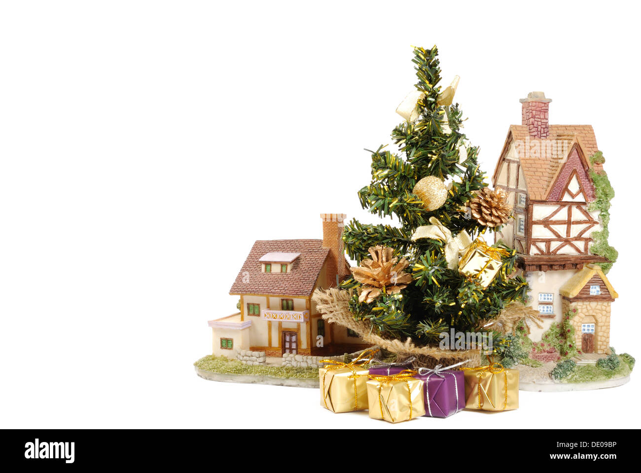 Christmas tree next to house Stock Photo - Alamy