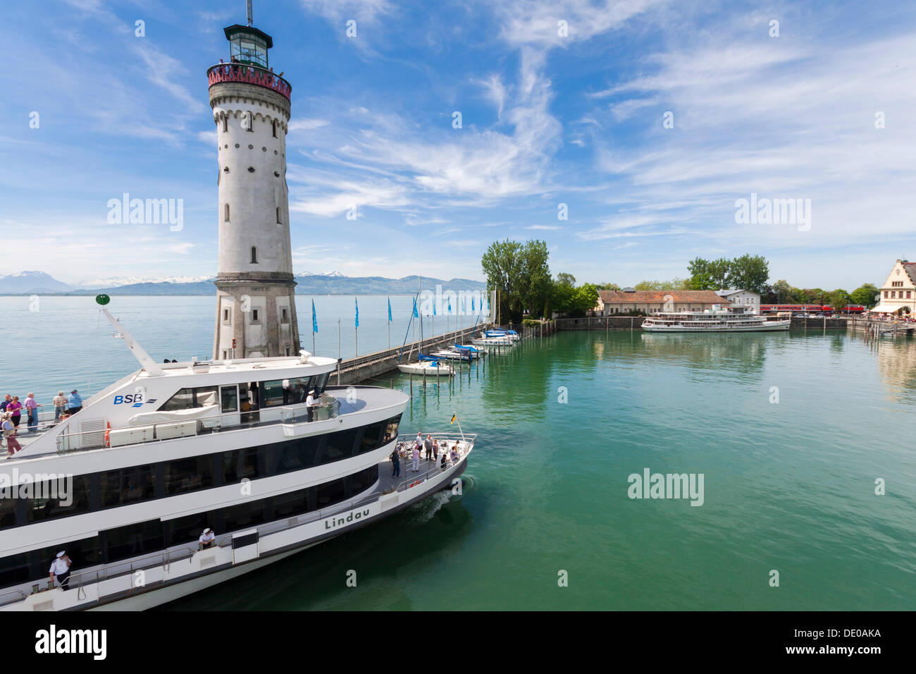 Harbor with lighthouse and boat hi-res stock photography and images - Alamy