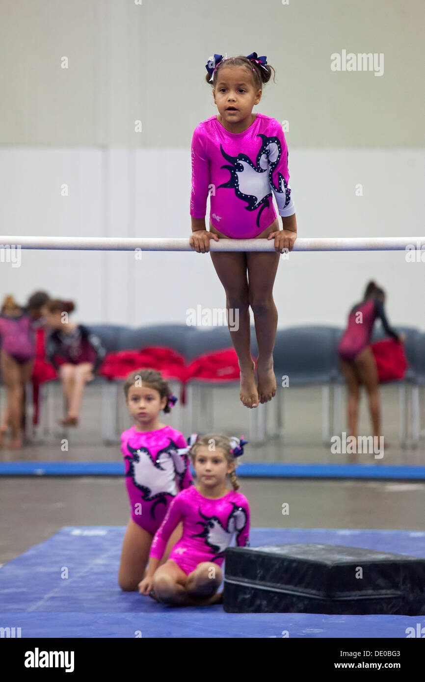 Gymnast on parallel bars hi-res stock photography and images - Alamy