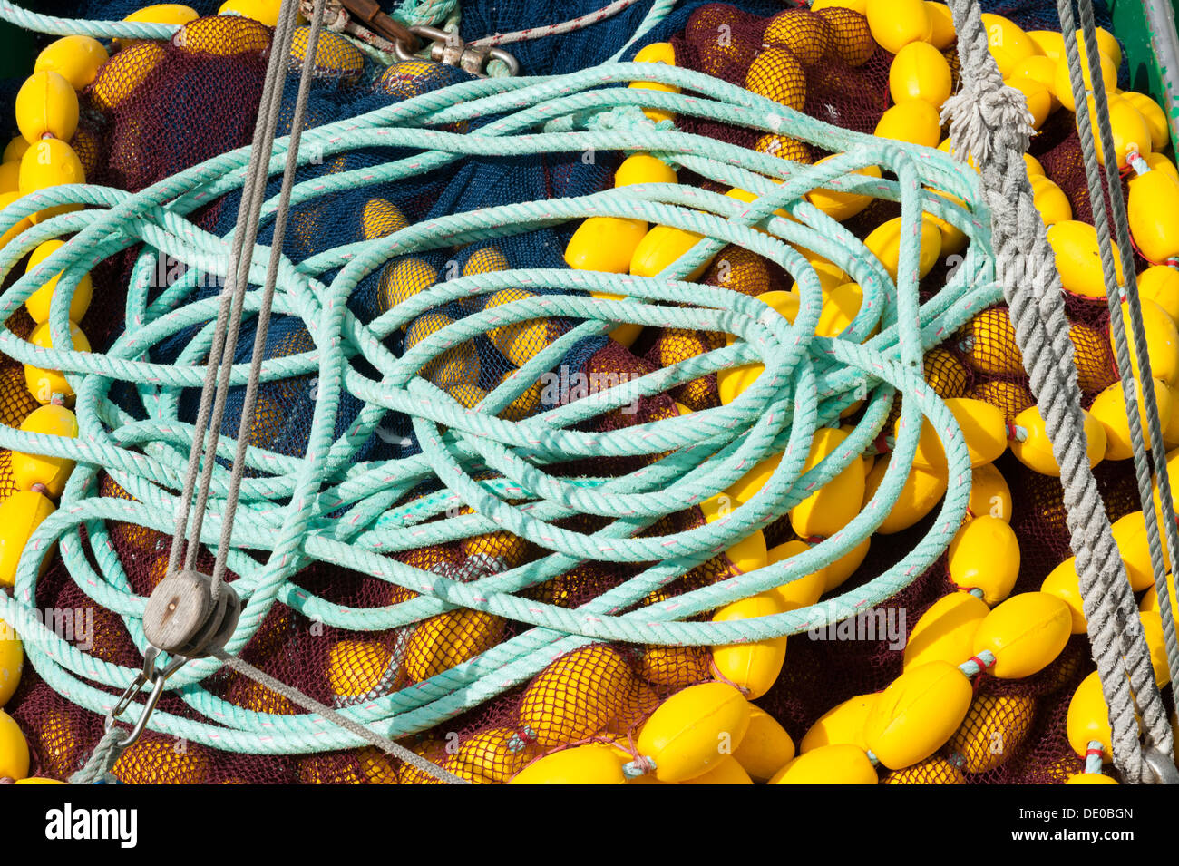 fishing nets and ropes in a pile Stock Photo - Alamy