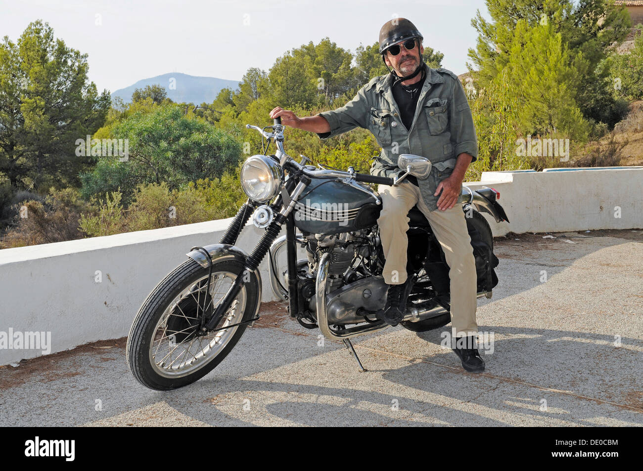 Elderly man sitting on motorcycle High Resolution Stock Photography and ...
