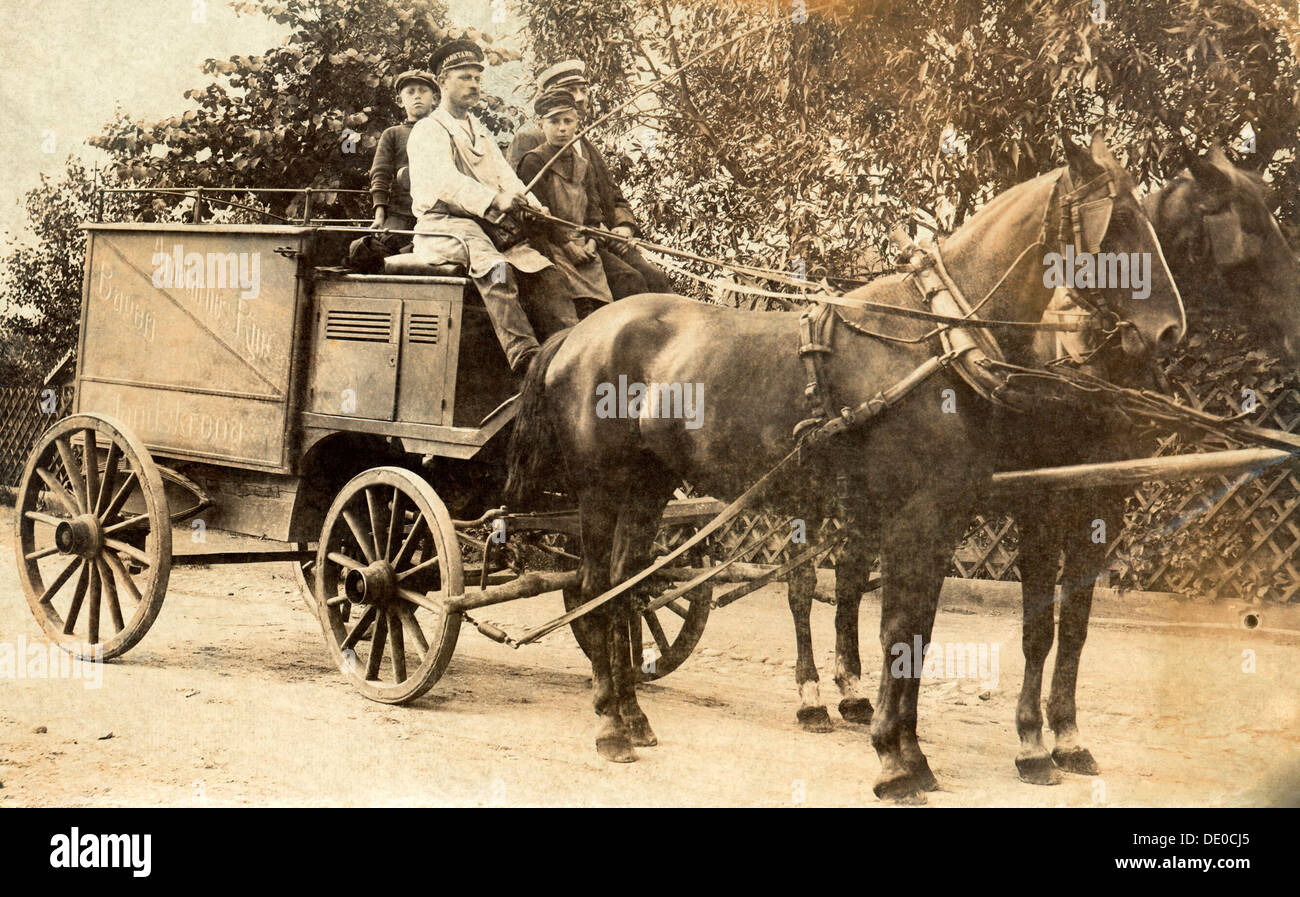 Horse-drawn bread wagon with driver and two errand boys, Sweden, c1910s ...
