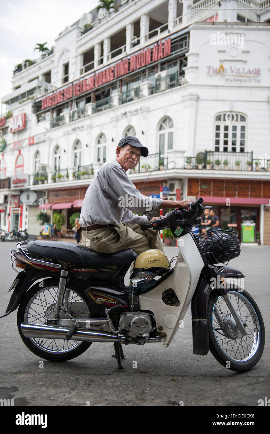 Motorcycle taxi driver siting on hi-res stock photography and images ...