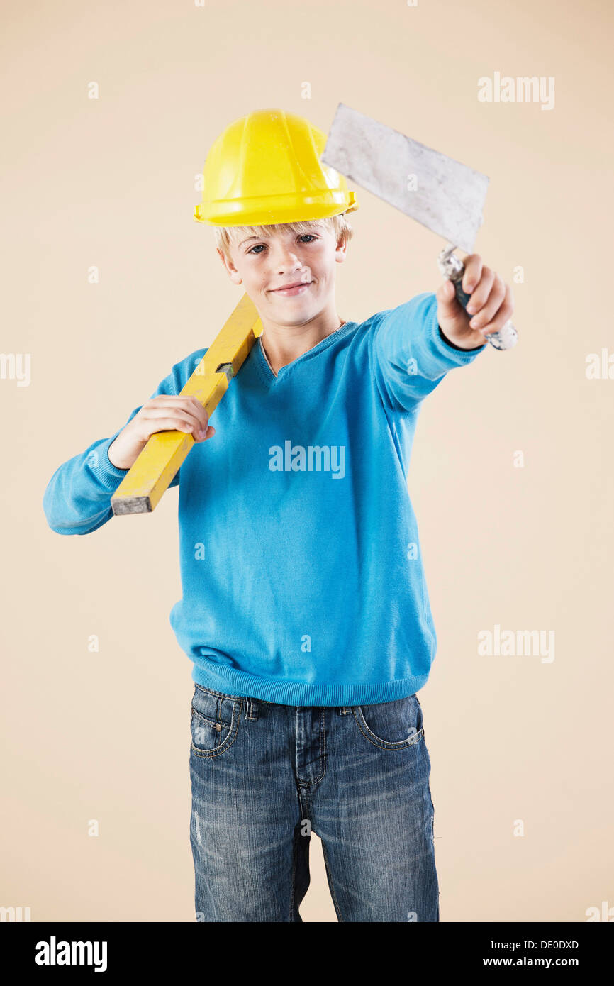 Boy dressed as a craftsman or workman Stock Photo - Alamy