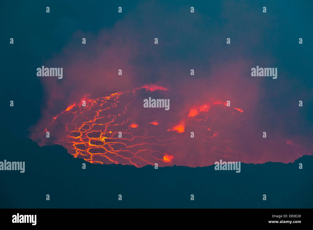 Boiling lava lake in the crater of Mount Nyiragongo volcano Stock Photo ...