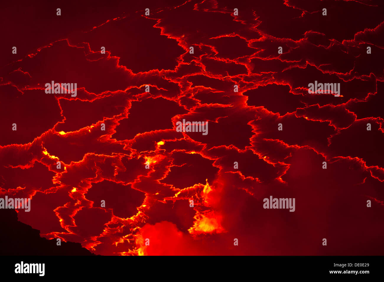 Boiling lava lake in the crater of Mount Nyiragongo volcano Stock Photo ...