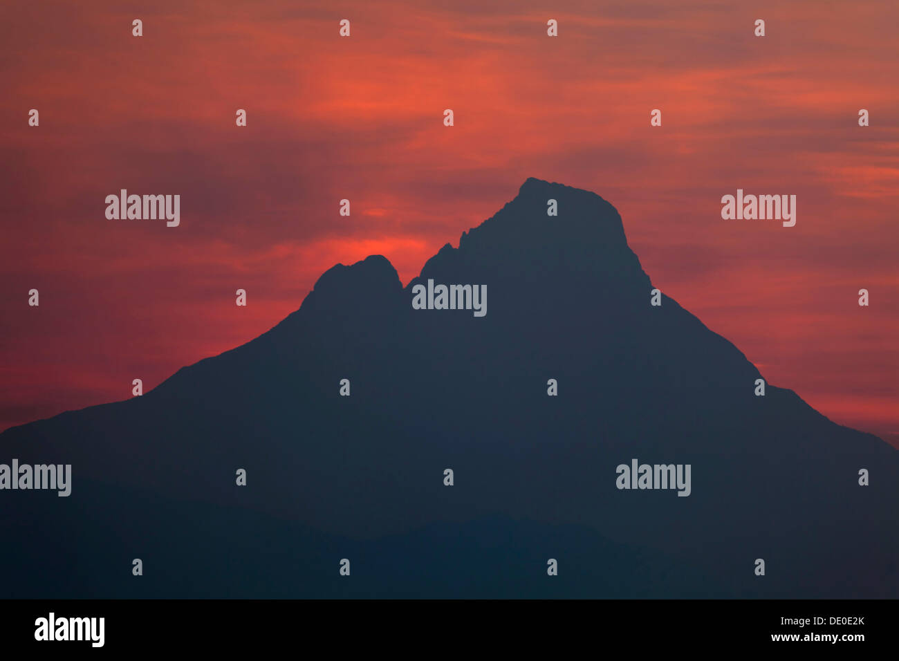Mount Mikeno volcano just before sunrise, dawn Stock Photo - Alamy