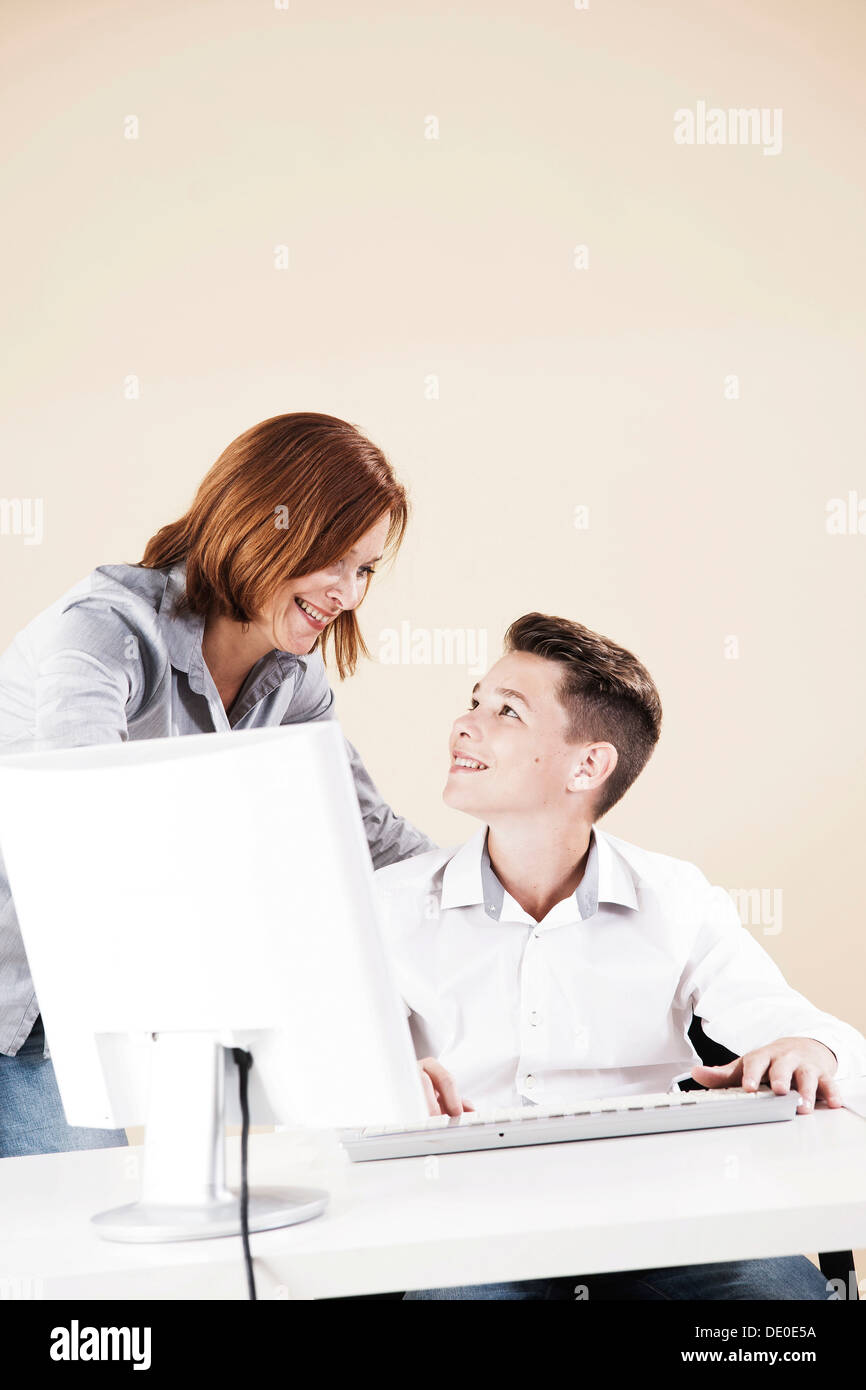 Boys helping each other hi-res stock photography and images - Alamy