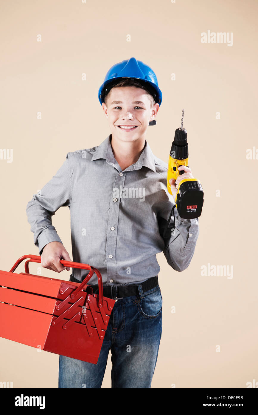 Boy dressed as a craftsman or workman Stock Photo - Alamy