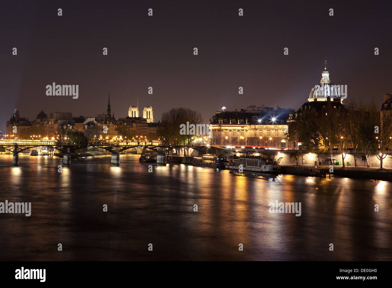 France, Paris, Seine River illuminated at night Stock Photo - Alamy