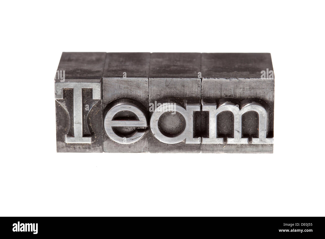Old lead letters forming the word Team Stock Photo - Alamy