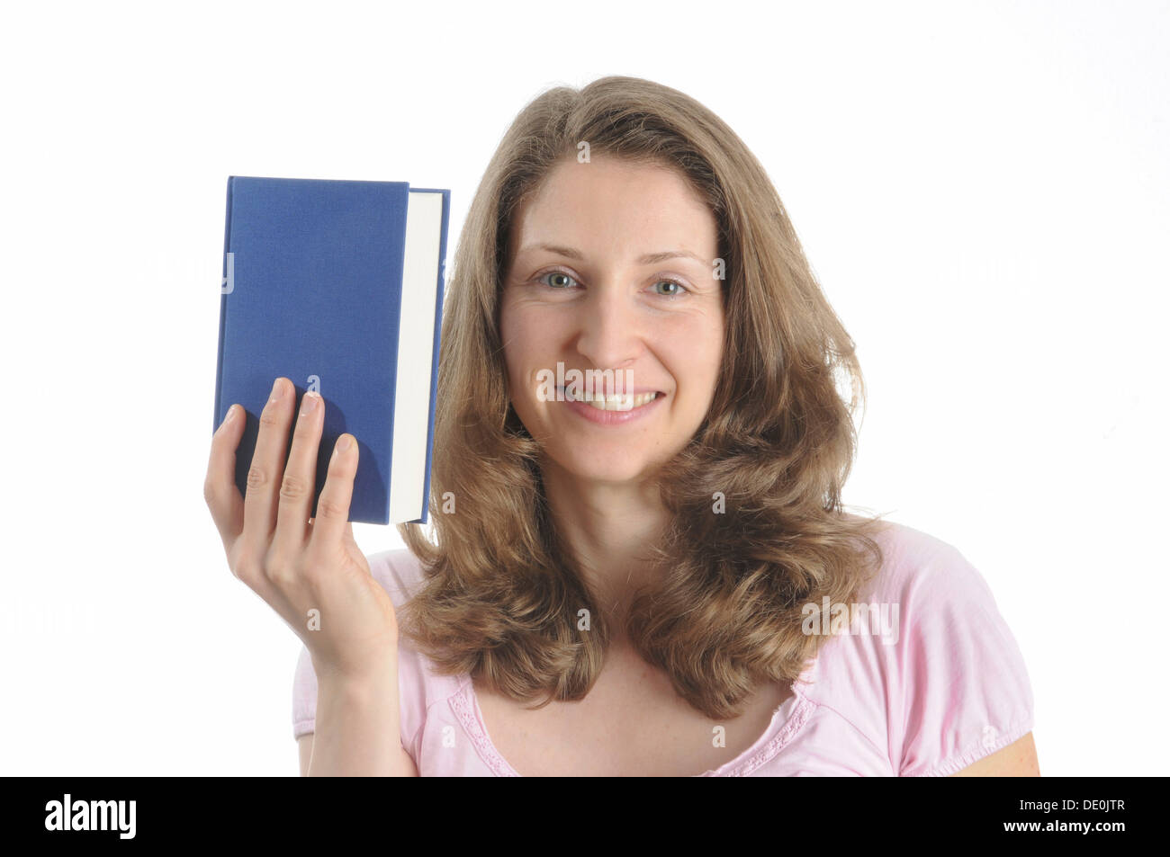 Woman holding book looks hi-res stock photography and images - Alamy