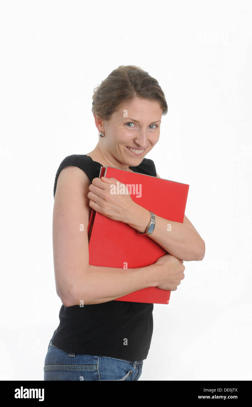 Young woman holding a red folder Stock Photo - Alamy