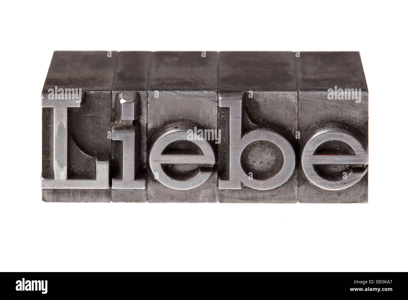 Old lead letters forming the word "Liebe", German for love Stock Photo ...