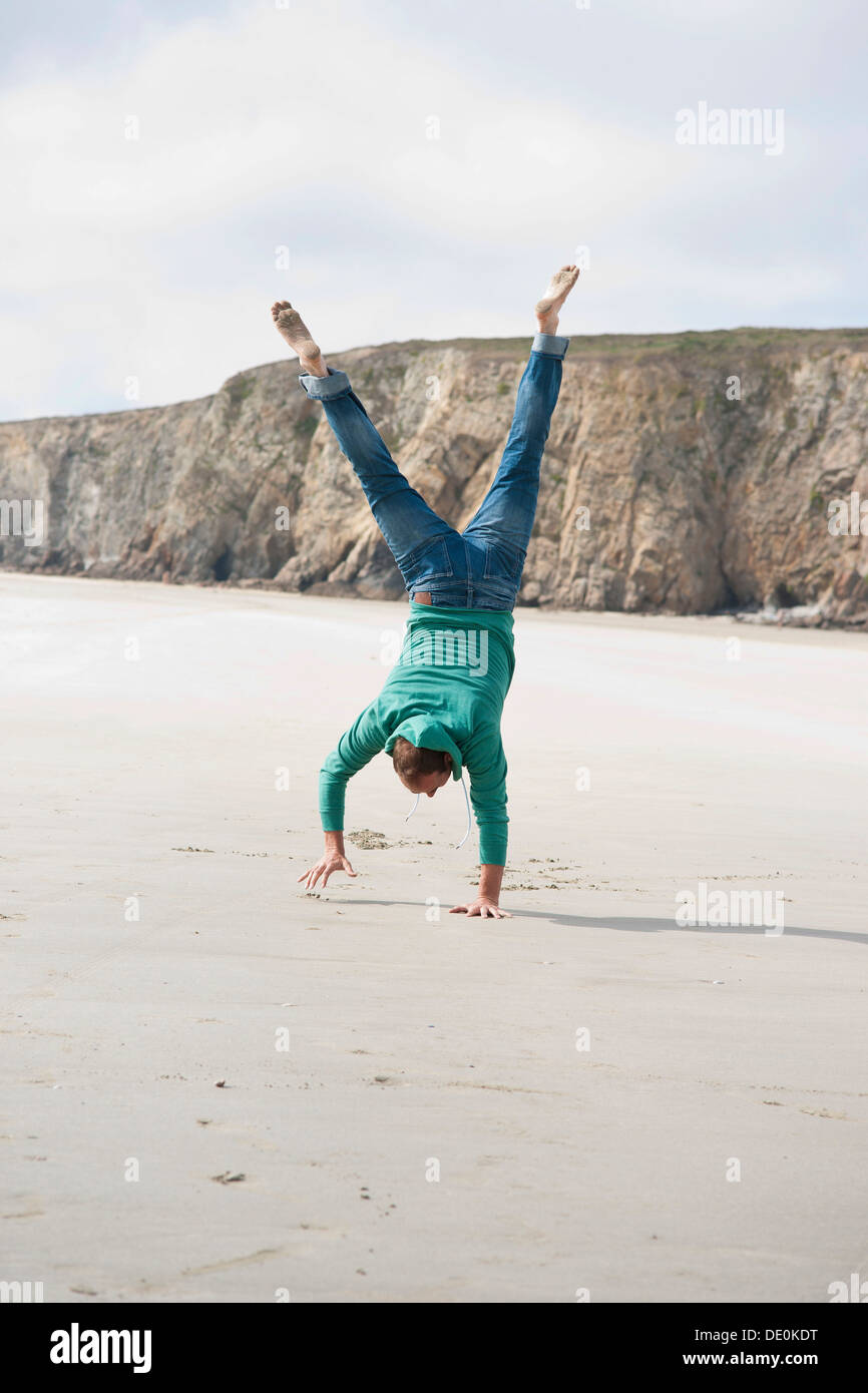 Handstands beach hi-res stock photography and images - Alamy