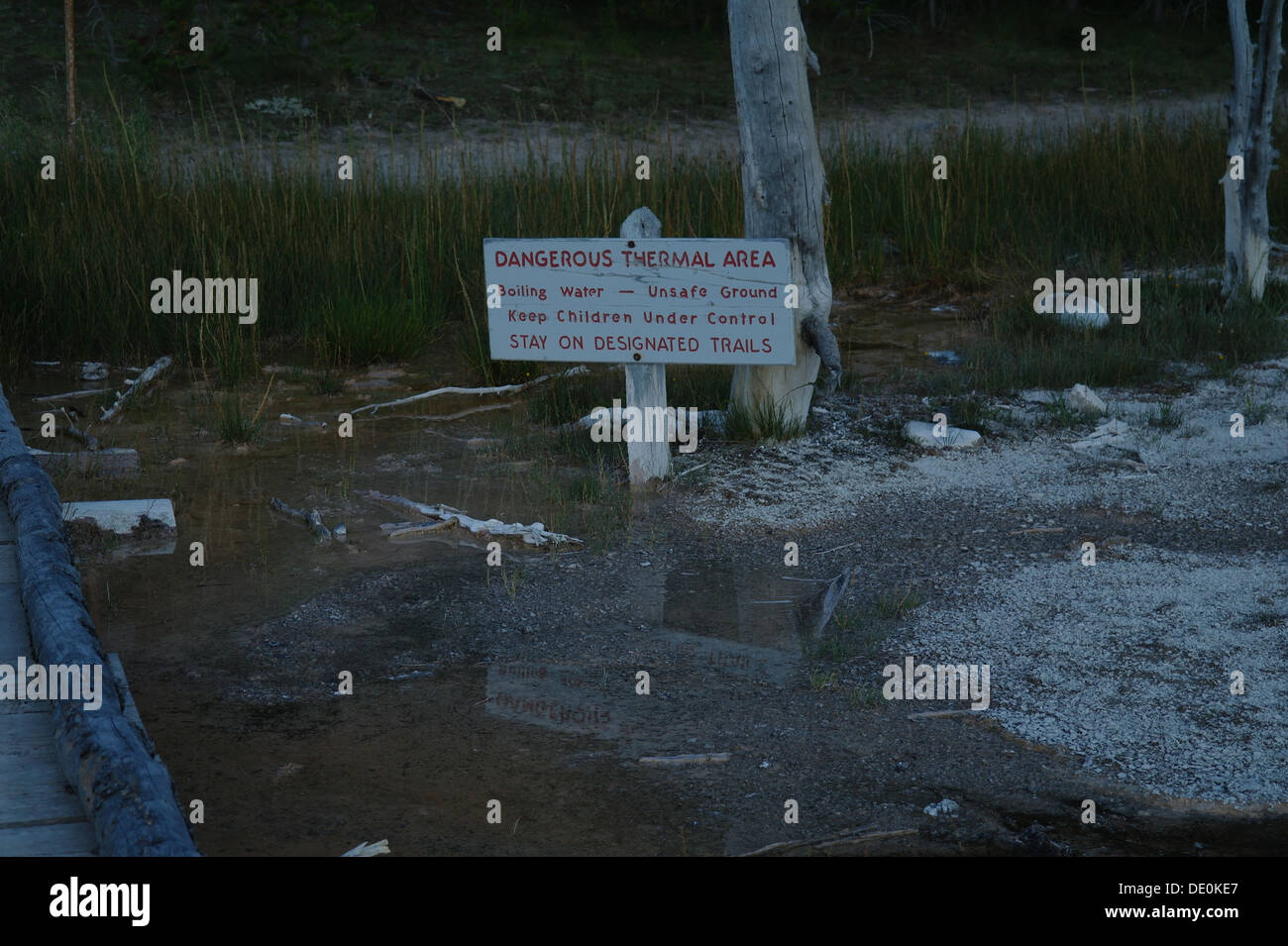 'Dangerous Thermal Area' warning sign rising grey sinter by path to ...