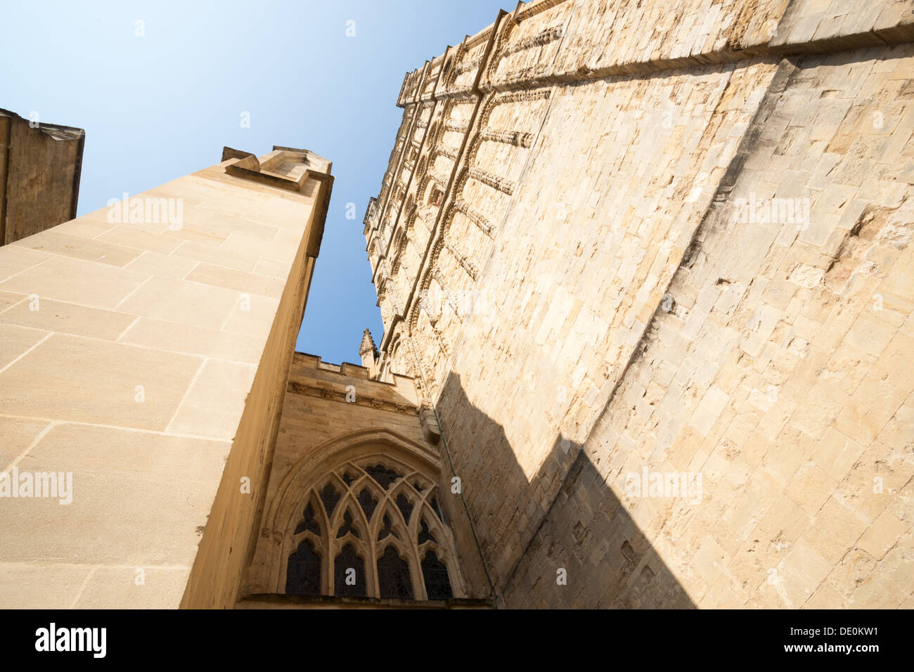 Exeter Cathedral rear yard looking up at the Gothic towers. Cathedral ...