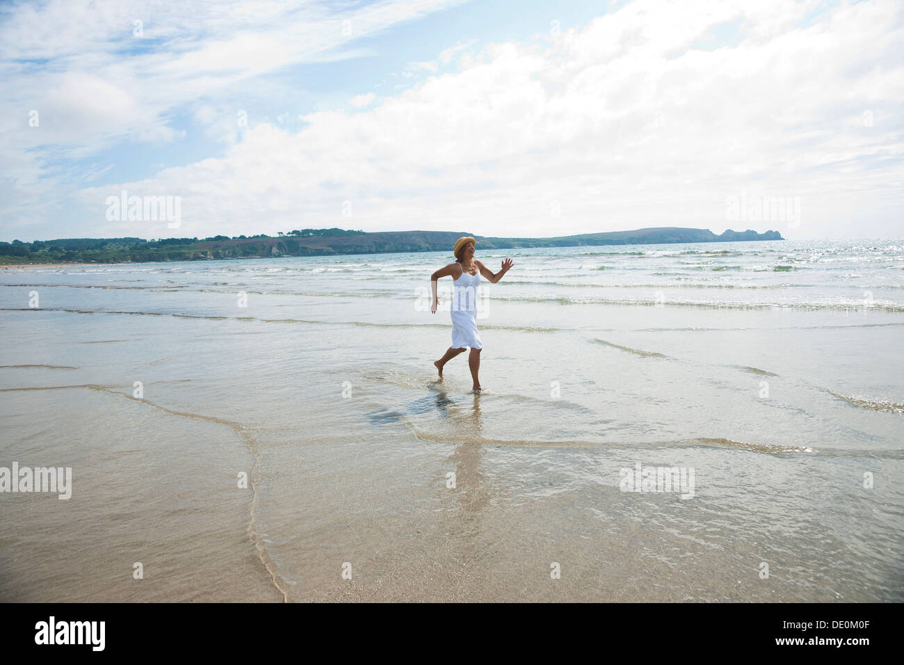 Running through waves hi-res stock photography and images - Alamy