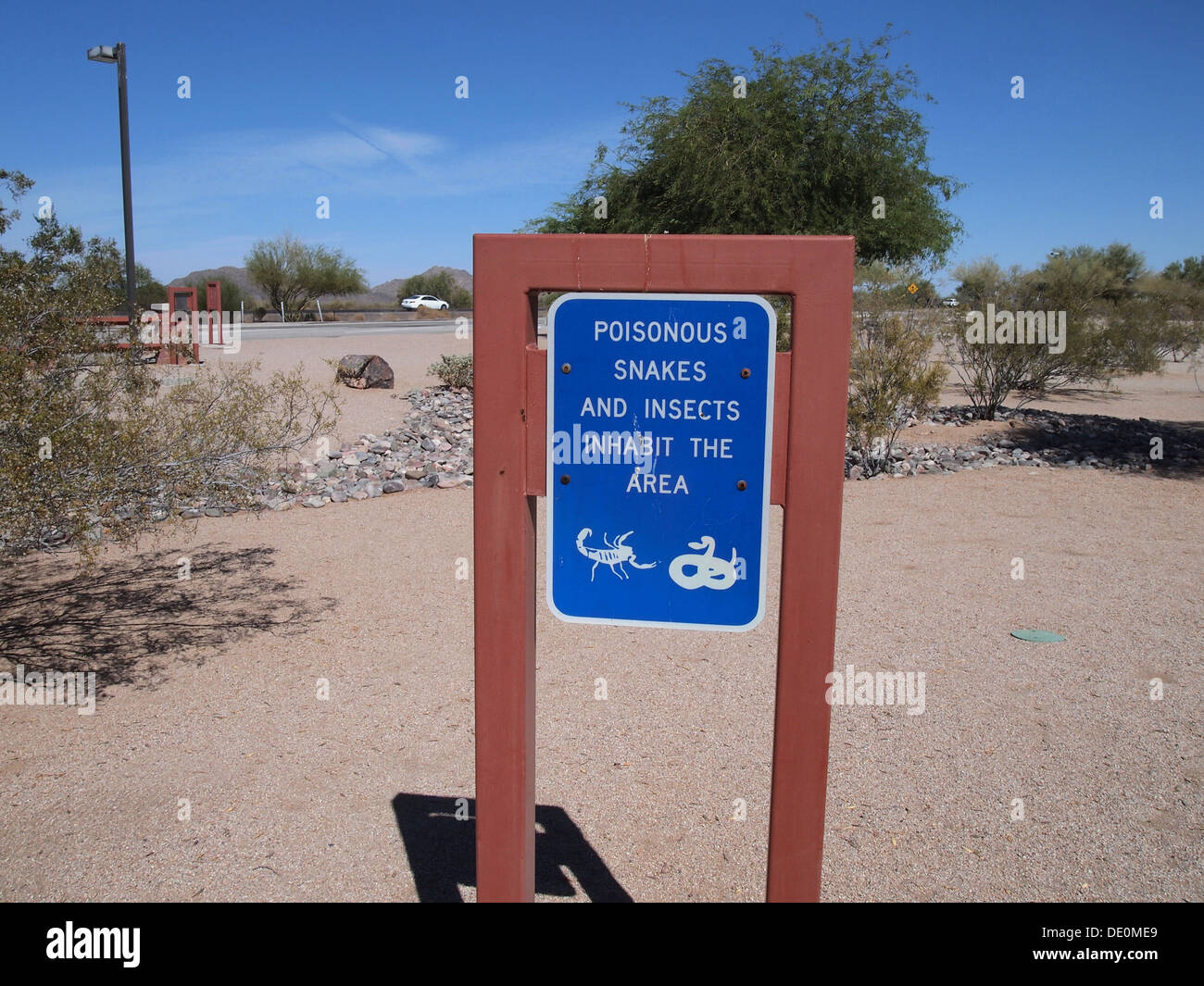 Sign warning of poisonous snakes and insects at a rest stop along I-10 ...