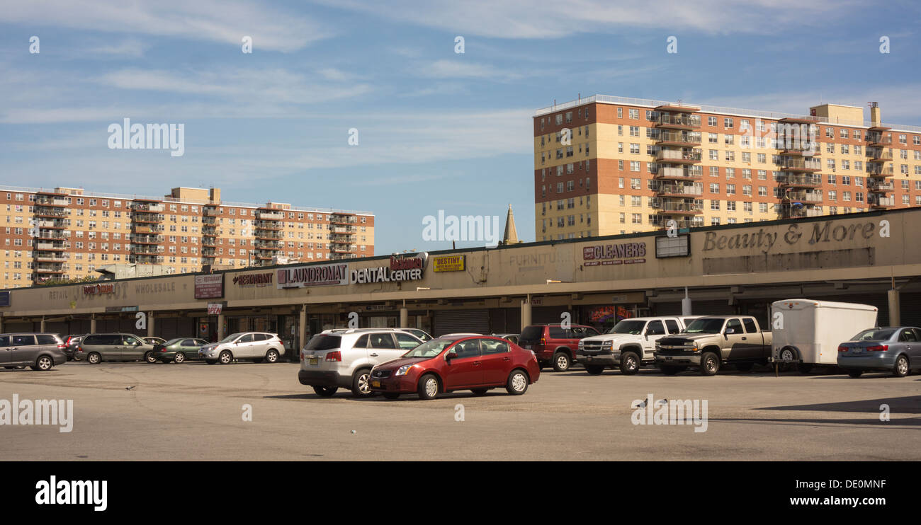 Strip mall shopping center, damaged by Hurricane Sandy, with only a few ...