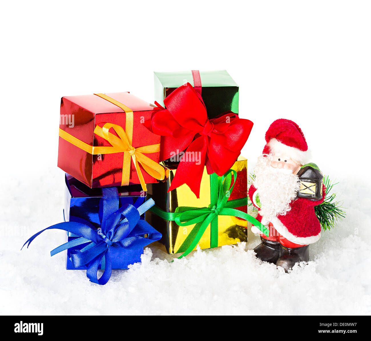 Christmas presents up on snow background Stock Photo - Alamy