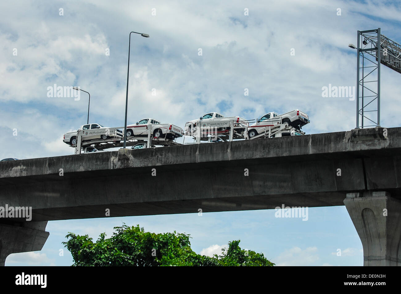 Car vehicles being transported in Thailand Stock Photo - Alamy