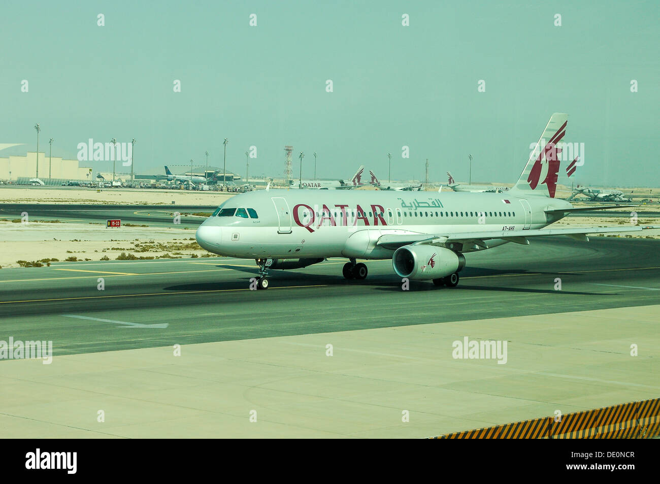 Qatar Airways jet on runway in Doha Qatar Stock Photo - Alamy