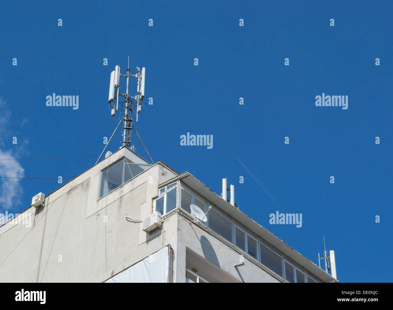Radio antennas on a building Stock Photo - Alamy