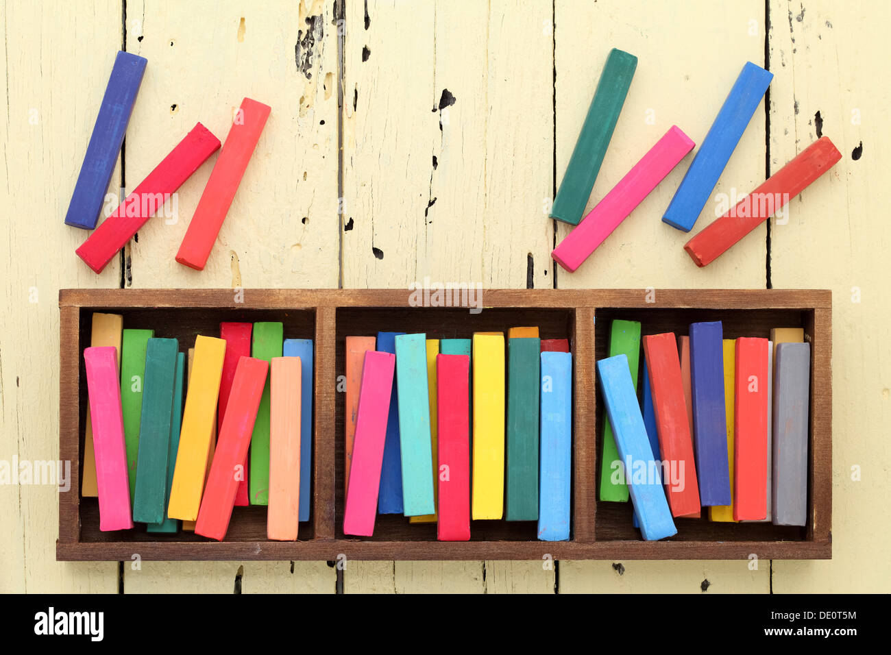 Kids drawing with crayons at a table hi-res stock photography and ...