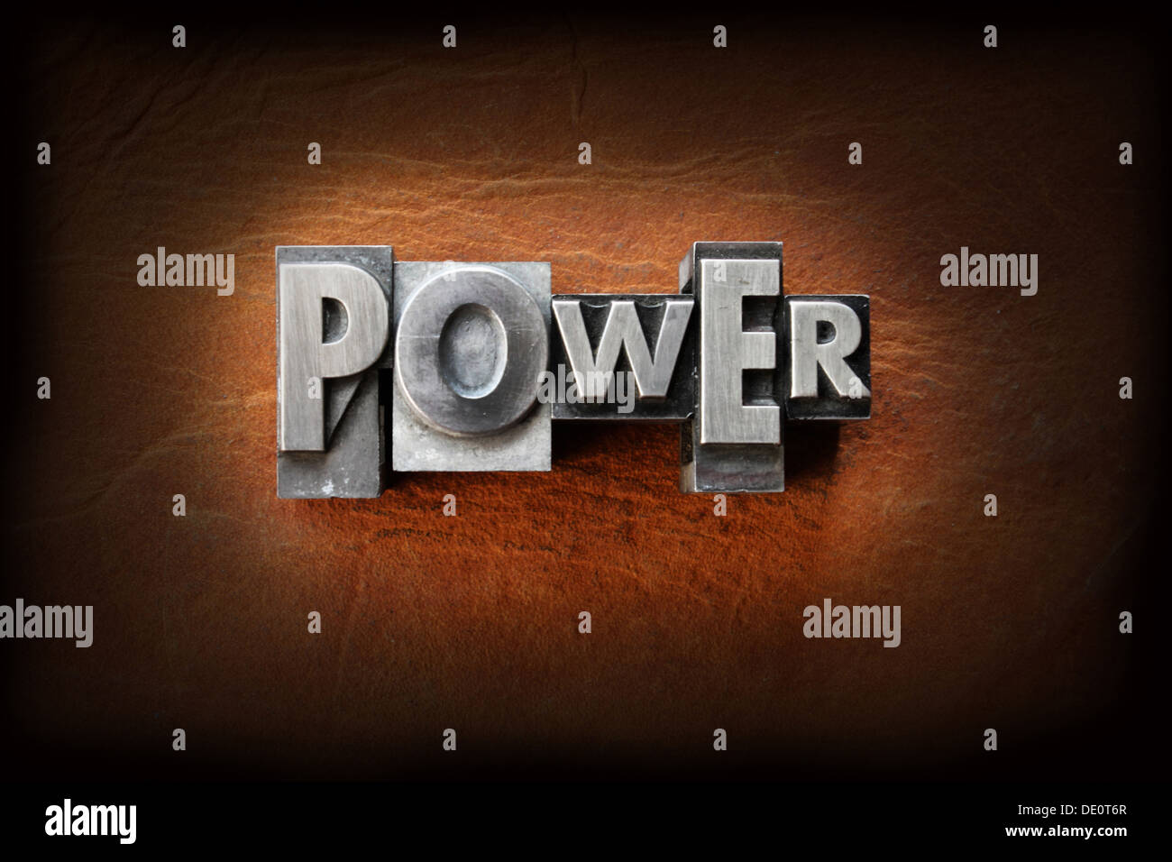 The word power made from vintage lead letterpress type on a leather ...