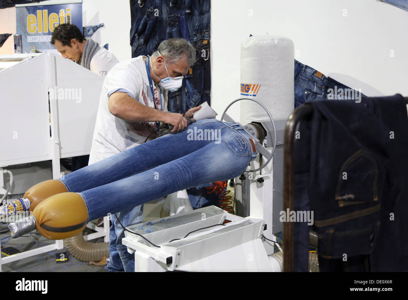 Jean production at the stand of "Pepe Jeans", the jeans getting ...