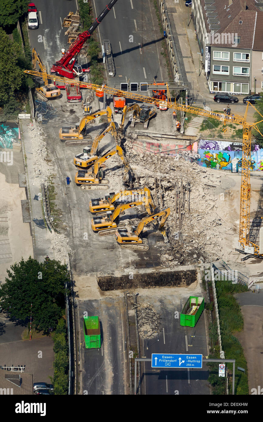 Aerial view, 8 demolition crawler excavators working on the demolition ...