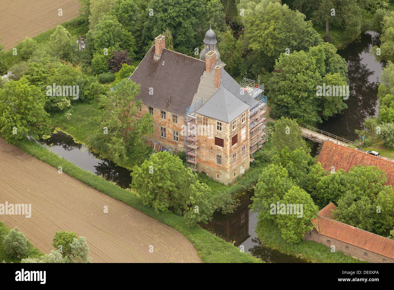 Aerial view, Wasserschloss Haus Nehlen moated castle with scaffolding ...