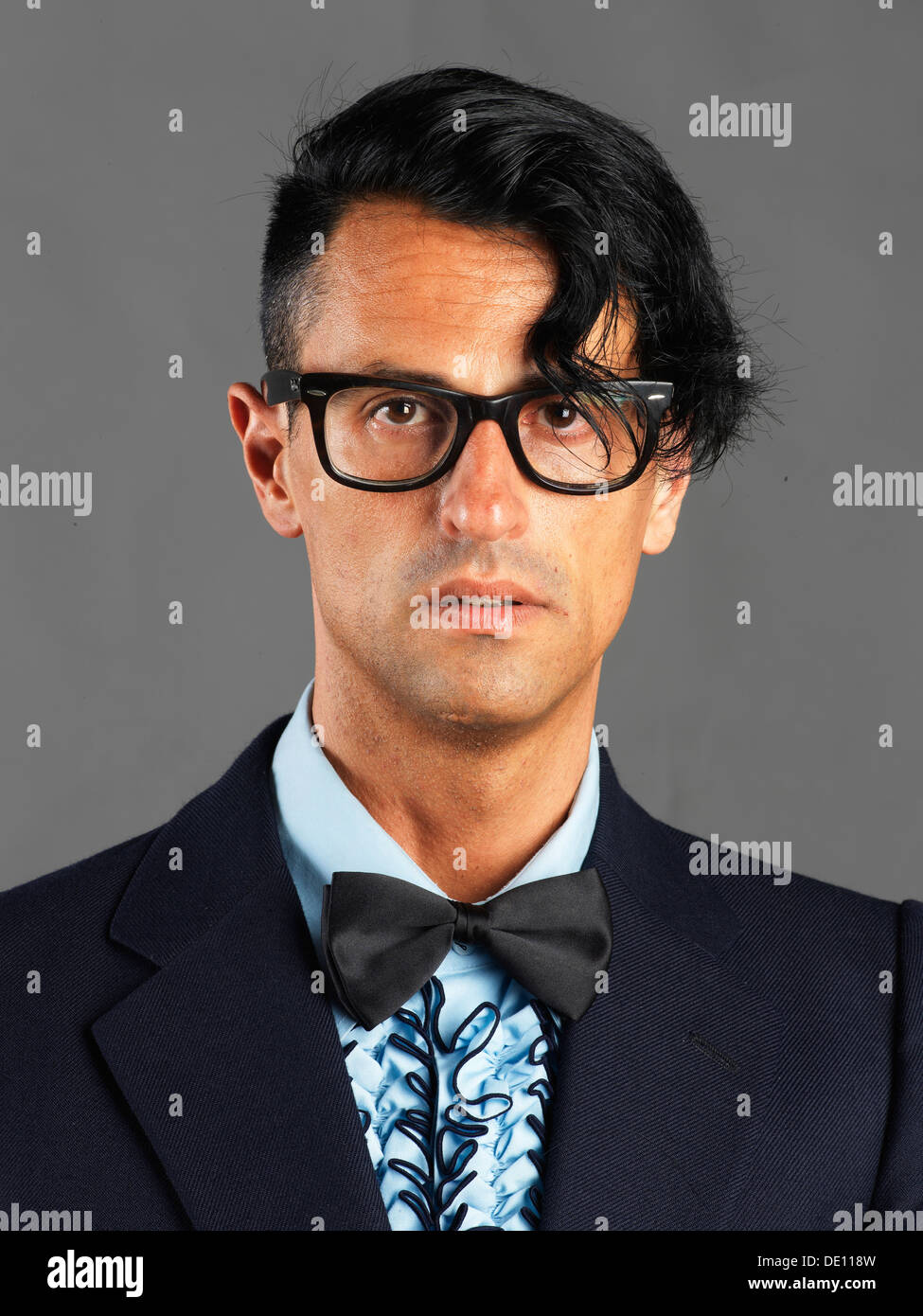 Portrait of a silly guy looking weird Stock Photo - Alamy