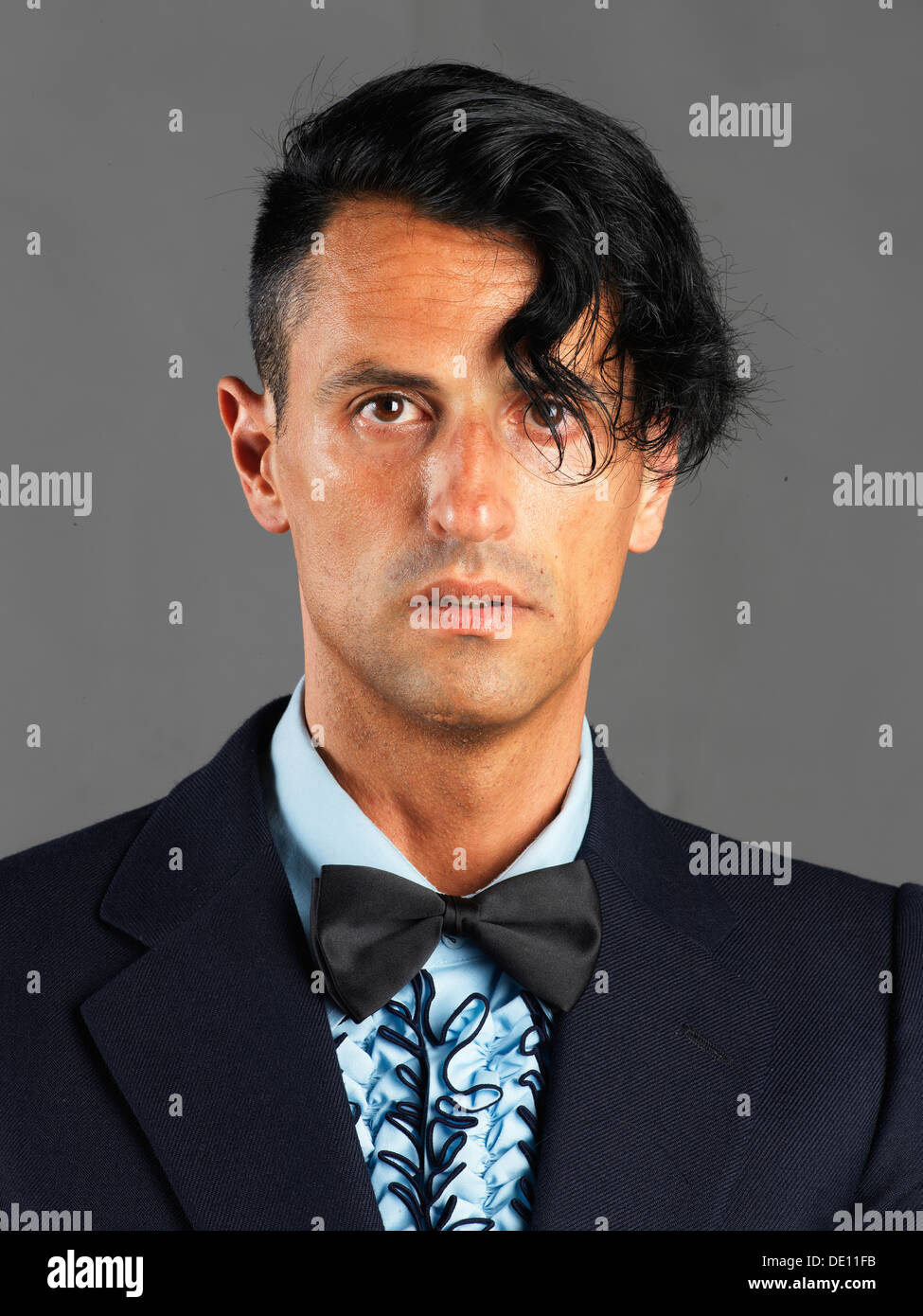 Portrait of a silly guy looking weird Stock Photo - Alamy