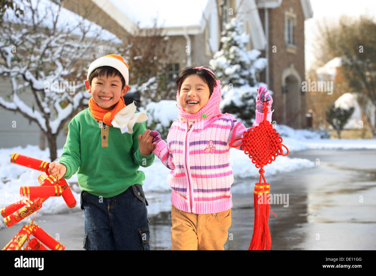 Children playing with firecrackers hi-res stock photography and images ...