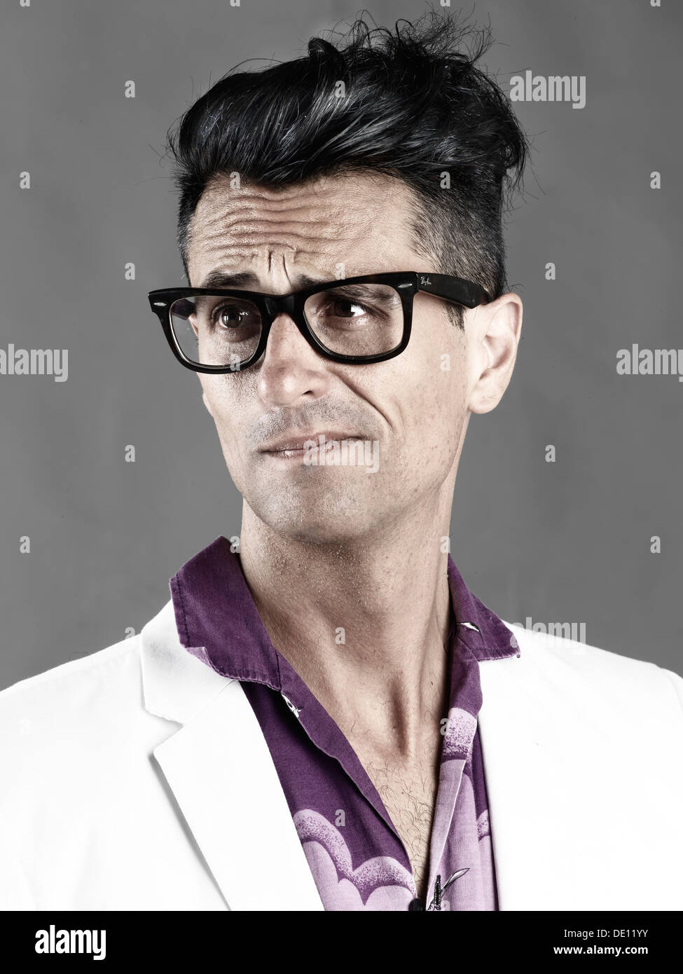 Portrait of a silly guy looking weird Stock Photo - Alamy