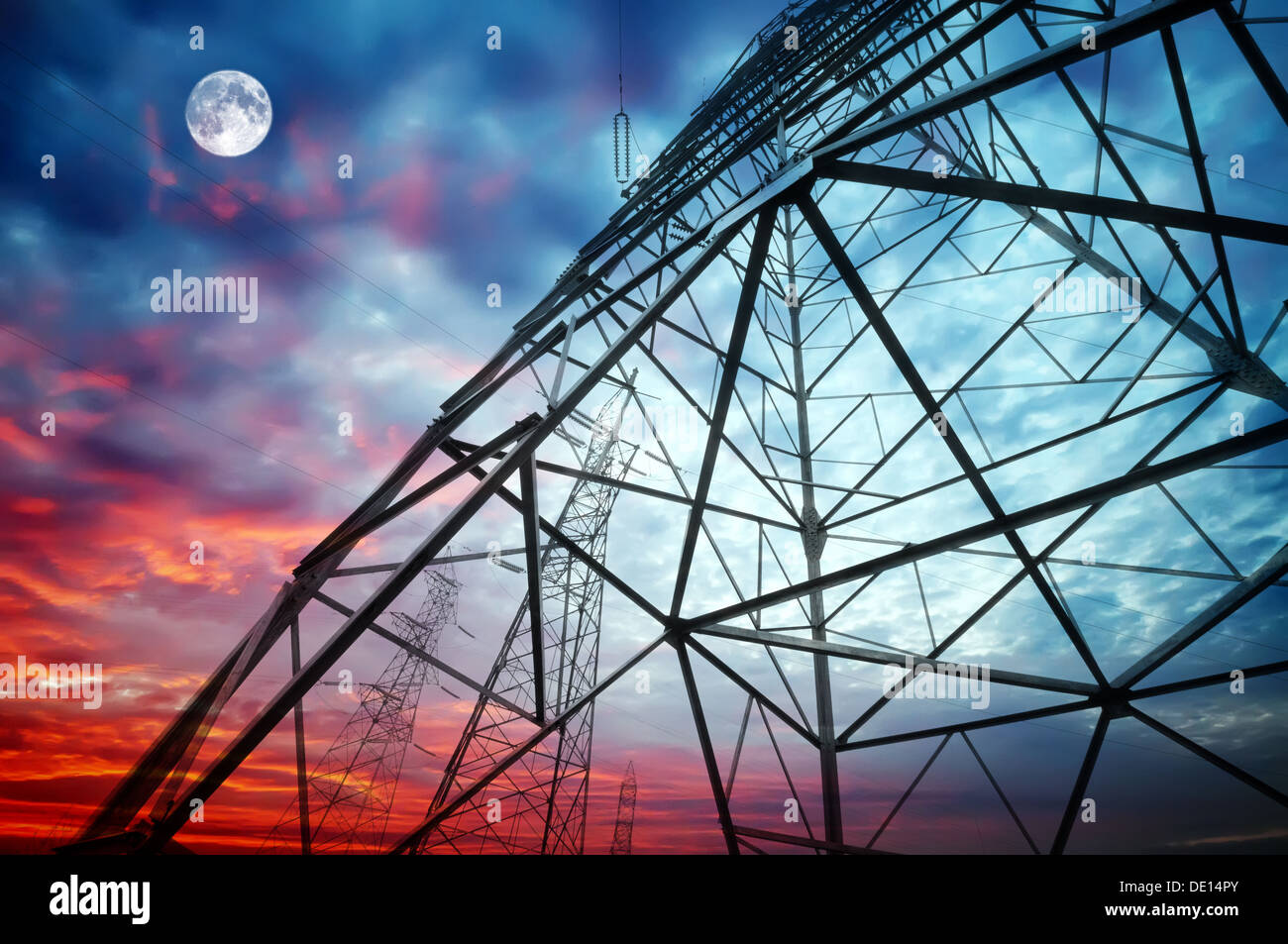 Transmission towers on night background Stock Photo - Alamy