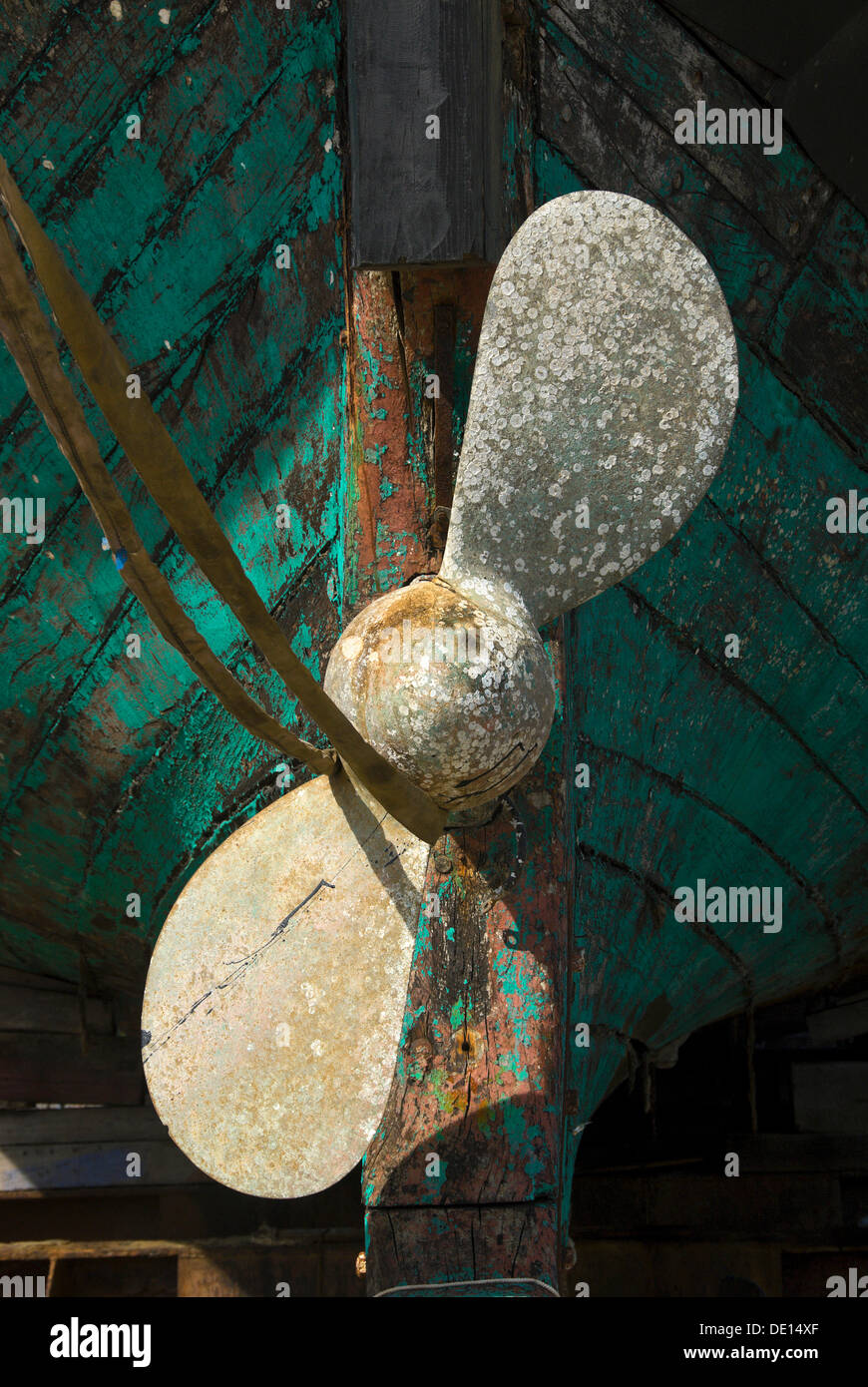 Ship propeller on an old fishing boat in dry dock, port of Hvide Sande ...