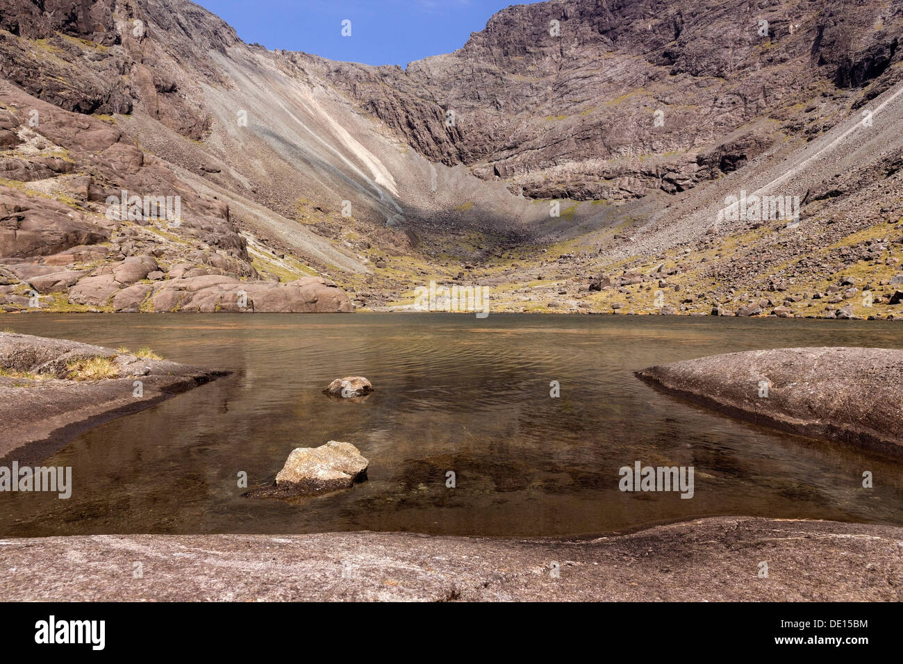 Glaciated mountain corrie and lake high in the Black Cuillin mountains ...