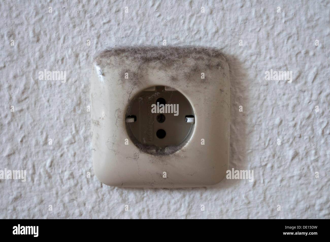 Dust on a wall socket Stock Photo - Alamy