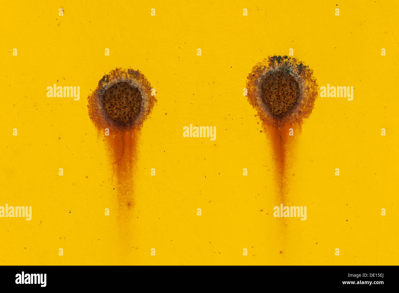 Yellow metal surface with rust Stock Photo - Alamy
