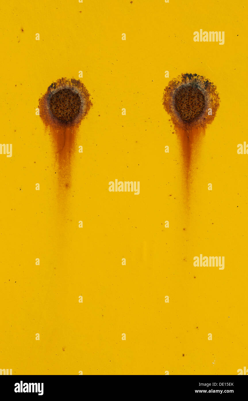 Yellow metal surface with rust Stock Photo - Alamy