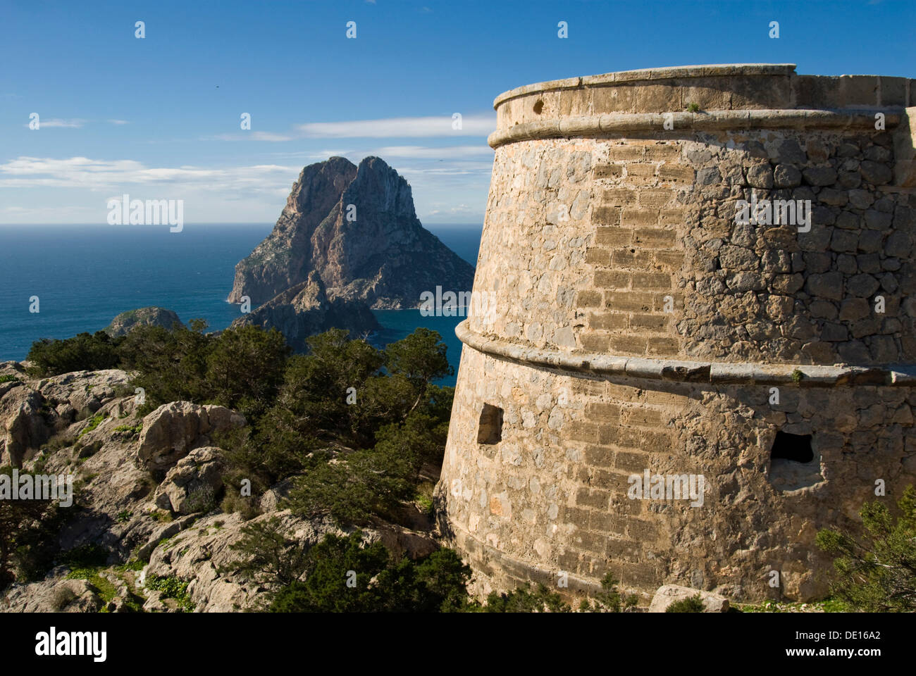 Tower of Es Savinar and cliff island of Es Vedrá, Ibiza, Spain, Europe ...