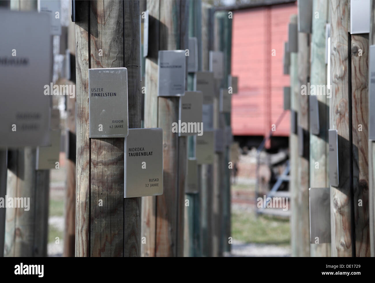 Poles with name tags of Jewish prisoners, a wagon which was used to ...