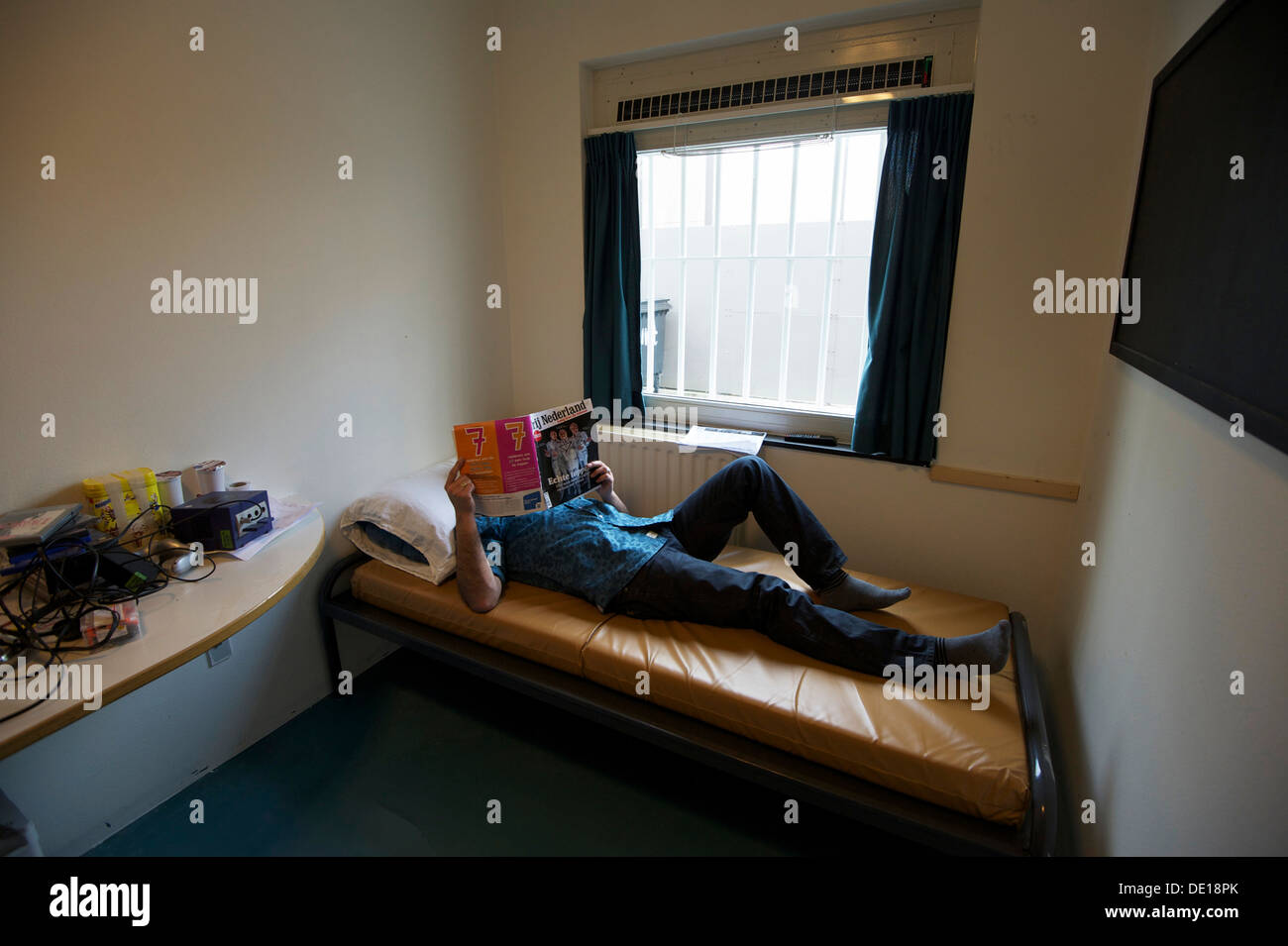 Holland-Scheveningen. 15-05-12. A man in prison Stock Photo - Alamy