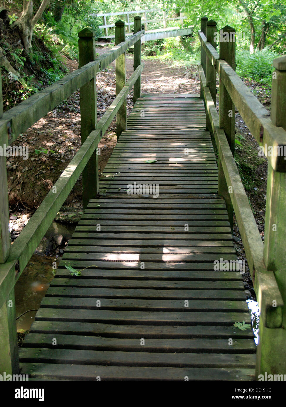 Wooden footbridge over a river, Stratton, Bude, Cornwall, UK 2013 Stock ...