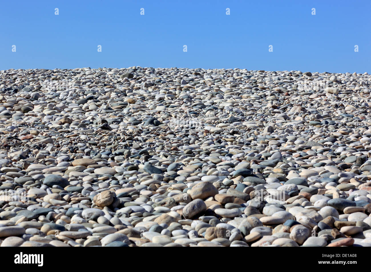 Stones, blue sky, large pebbles Stock Photo - Alamy