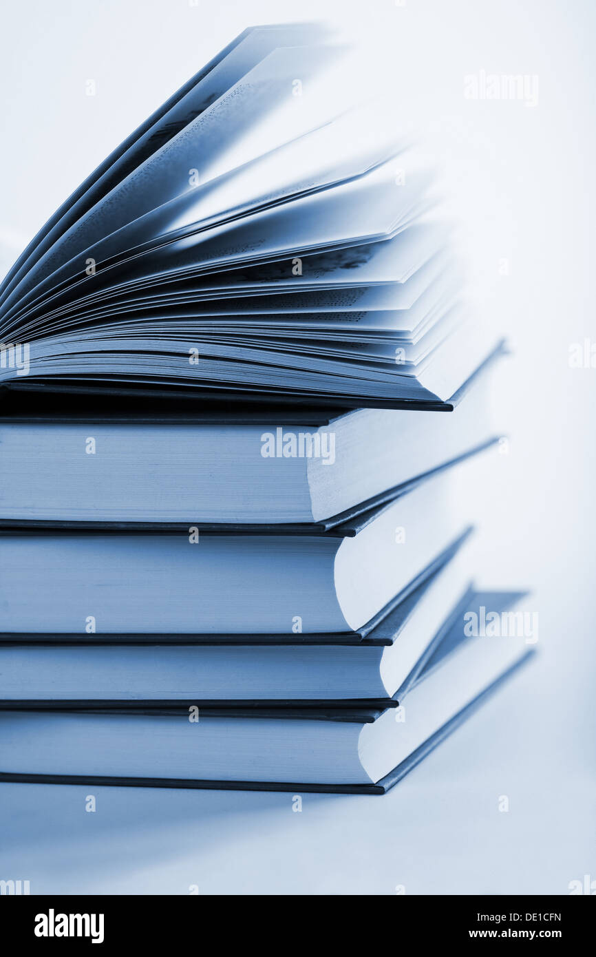 Pile of open books hi-res stock photography and images - Alamy